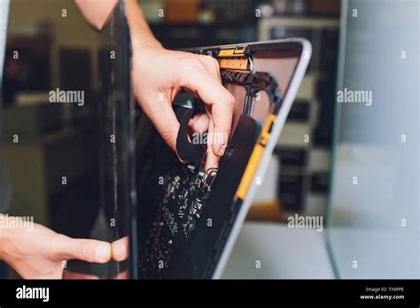 Process Of Computer Repair Engineer In White Gloves Disassembling