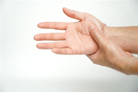 Photo De La Douleur Ou Du Spasme Dans Le Pouce Des Muscles Qui Se