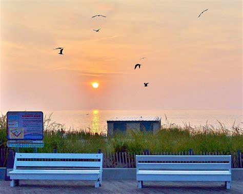 Sunrise At Rehoboth Beach Boardwalk Photograph By Kim Bemis Fine Art