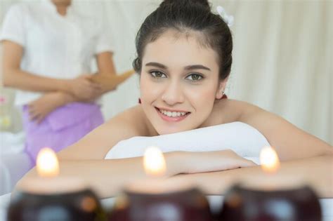Premium Photo Young Woman Lying On Massage Table In Spa