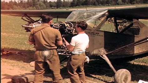 U S Army Aircraft Mechanics Repair A Stinson L 5 Airplane In Germany