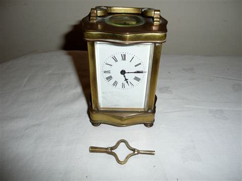 Antique Brass Serpentine Case Carriage Clock In Good Original