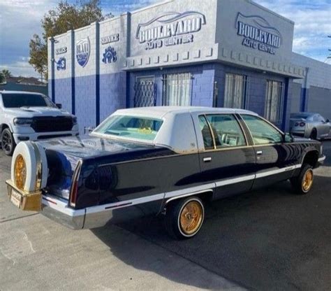 Classic Cadillac Fleetwood With Gold Rims