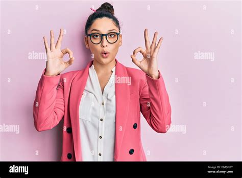 Beautiful Middle Eastern Woman Wearing Business Jacket And Glasses