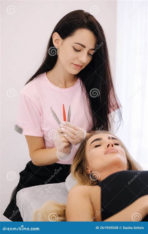 Woman Doing Eyebrow Correction And Lamination In Beauty Studio Blond Hair Model Has Staining