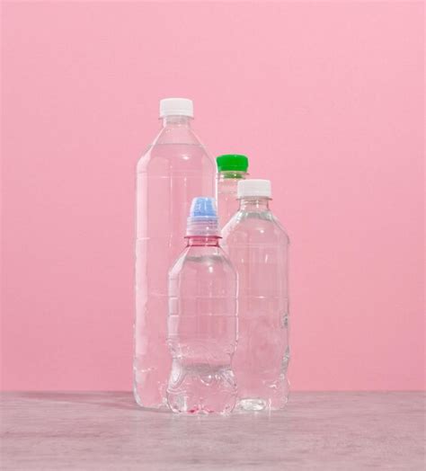 Premium Photo Thirst Quenching Plastic Bottles With Clear Water