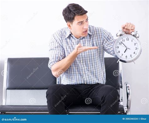 Man Nervously Impatiently Waiting In The Lobby Stock Photo Image Of
