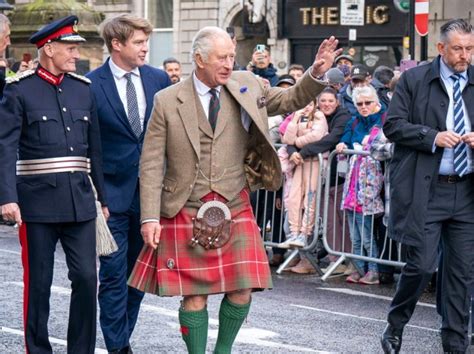 King Charles Dons A Kilt To Wave To Crowds And Meet Refugees In