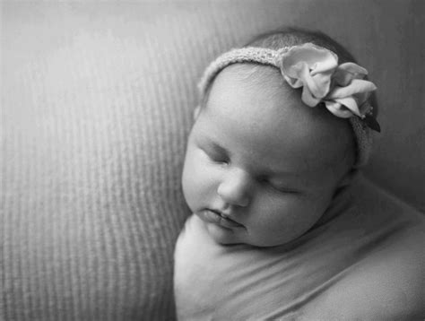 Safe Posing Of A Newborn On Their Back By Brisbane Best Newborn Photographer