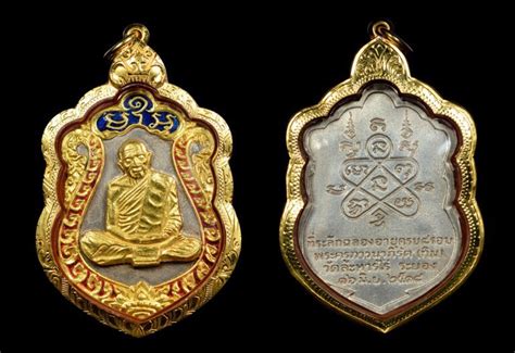 ประมูล เสมาหลวงปู่ทิมเนื้อเงินลงยาหน้ากากทองคำ พระล้านนา คอม เว็บ พระ
