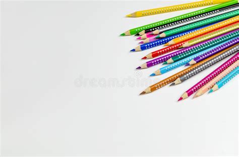 Colored Pencils For Drawing Various Colors On A White Background Stock