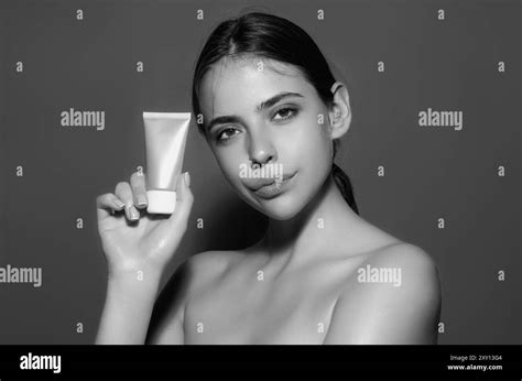Skin Care Woman Applying Face Cream Studio Portrait Beautiful Model