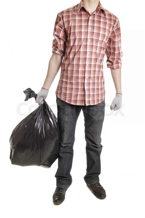 Man Holding Black Plastic Trash Bag In His Hand Stock Image Colourbox