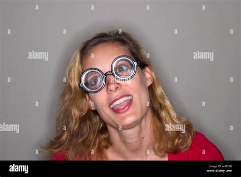 Yong Blond Woman Wearing Toy Glasses With Thick Lenses Model Released
