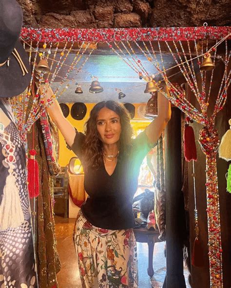 A Tight Black Top Shows Off Salma Hayeks Age Defying Curves As She