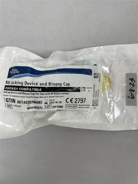 New Boston Scientific 4527 Rx Locking Device And Biopsy Cap For Use
