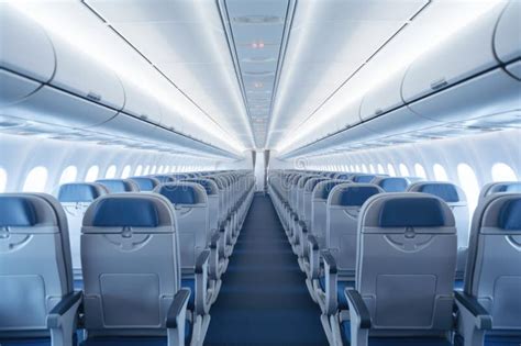 Empty Passenger Seats In Cabin Of The Aircraft Plane Interior