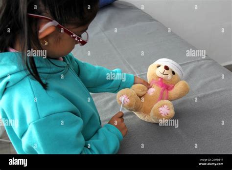 4 Year Old Brunette Latina Girl With Glasses Represents Mistreatment