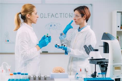 Premium Photo Olfaction Female Scientists Examining Smells