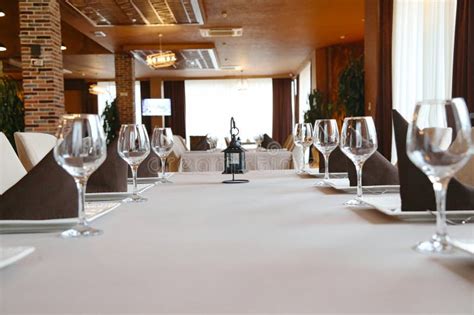Elegant Table Setting With Wine Glasses And Place Settings Stock Image