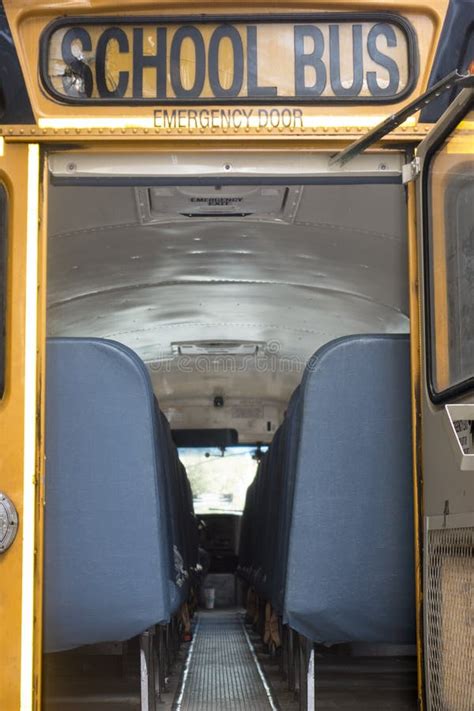 Yellow Orange And Black School Bus With Wide Open Emergency Back Door