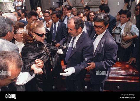 Movie Star Maria Felix Left Is Led By Funeral Attendants During The