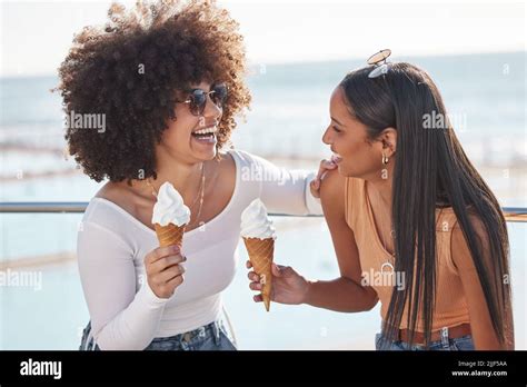 The Sisterhood Is Strong With These Two Two Young Friends Enjoying Ice