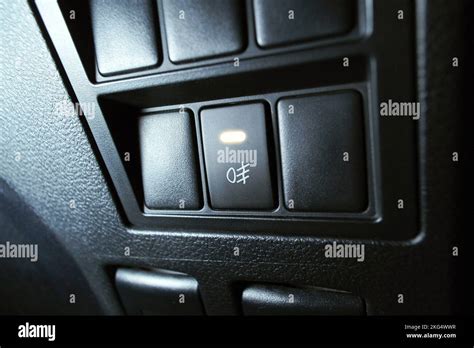 Automotive Spotlight Button Switch On Dashboard In The Car The