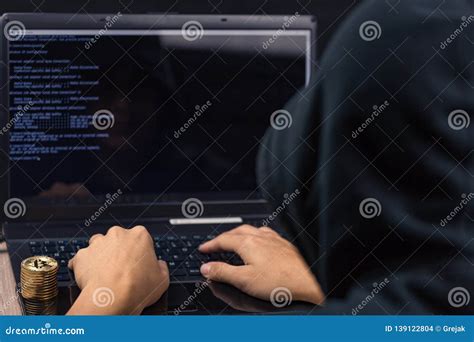 Hooded Hacker Using Laptop To Steal Bitcoin Stock Photo Image Of