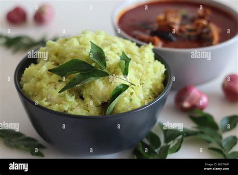 Mashed Tapioca Served With Pomfret Fish Curry Boiled And Strained