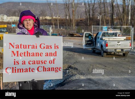 A Resident Holding A Sign Outside The Spectra Pipeline Construction