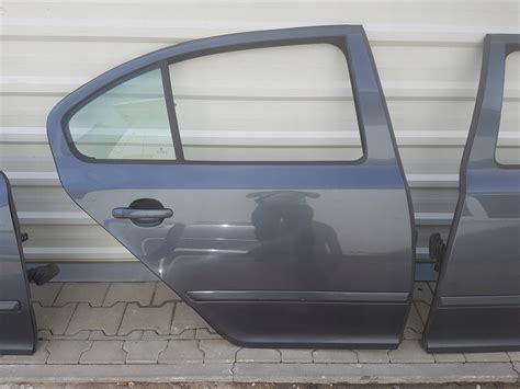 SKODA OCTAVIA II LIFT HB DRZWI PRAWE TYŁ LF J oficjalne archiwum Allegro