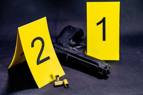 Gun Bullets And Crime Scene Marker With Number Five Isolated On White