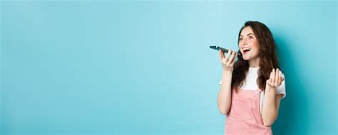 Free Photo Young Woman Using App Translator On Smartphone Speaking