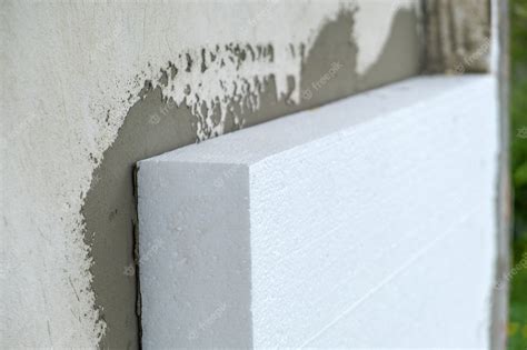 Premium Photo Installation Of Styrofoam Insulation Sheets On House Facade Wall For Thermal