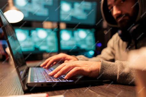 Premium Photo Male Hacker Using Security Breach To Hack Server