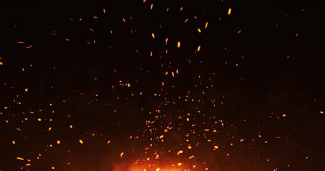 Flying Sparks And Embers From A Fire Abstract Glowing Particles Of Burning Fire And Smoke On A