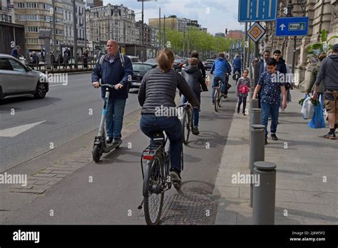 People Cycling Around Antwerp Belgium On Cycle Paths Where Cycling Is