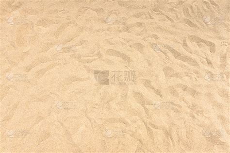 背景和纹理的黄沙图案在一个海滩在夏天
