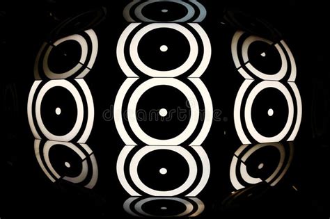 Large Black And White Showing Screen Hangs From The Ceiling Of A