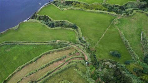 Drone Shot Of A Cliff With Green Fields And Meadows Stock Video Video