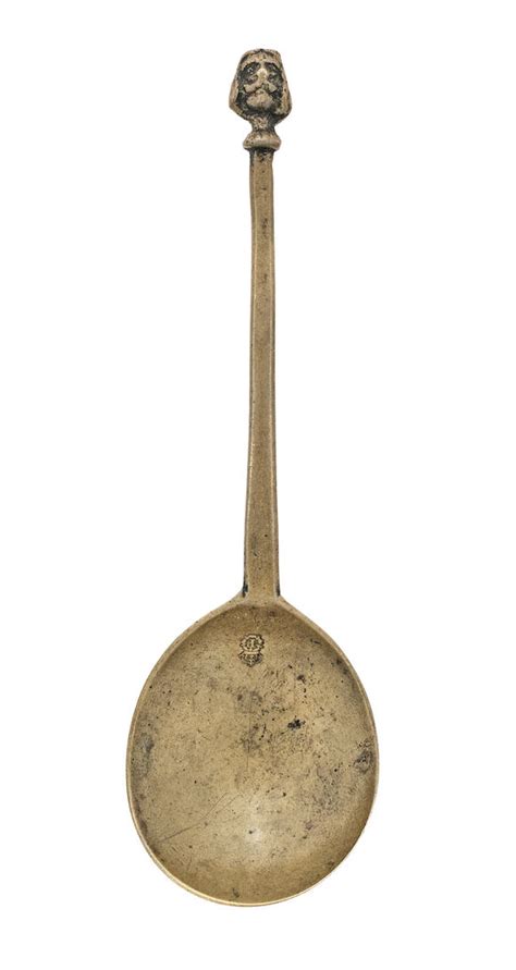 Bonhams A Rare Latten Mans Head Knop Spoon Circa 1640