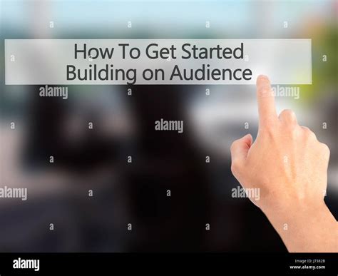How To Get Started Building on Audience - Hand pressing a button on blurred background concept ...