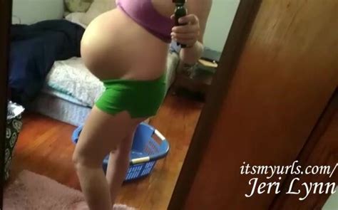 A Female With A Large Stomach