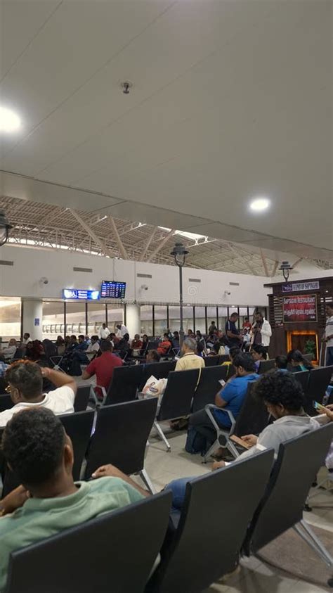Travellers Or Passengers Waiting Near Boarding Gate After Security