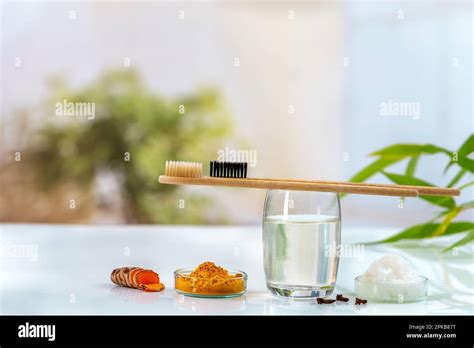 Homemade Toothpaste Made From Turmeric Coconut Oil And Cloves Stock