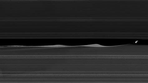 Nasas Cassini Capture Of Saturns Ring Bound Moon Daphnis As It