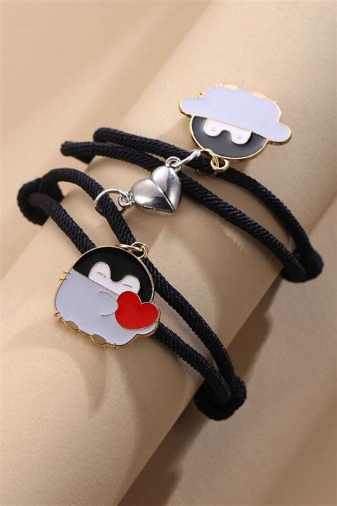 Set Bratari Pentru Cupluri Pinguini Indragostiti Prindere Cu Inima Magnetica Negru Emag Ro