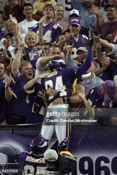 Minnesota Vikings Randy Moss Victorious Jumping Into Stands With