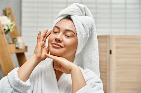 Premium Photo Smiling Asian Woman With Acne And White Towel On Head